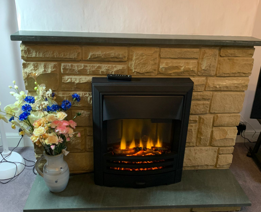 Contemporary Log Effect Electric Fire Installation - Ruislip - Rigbys