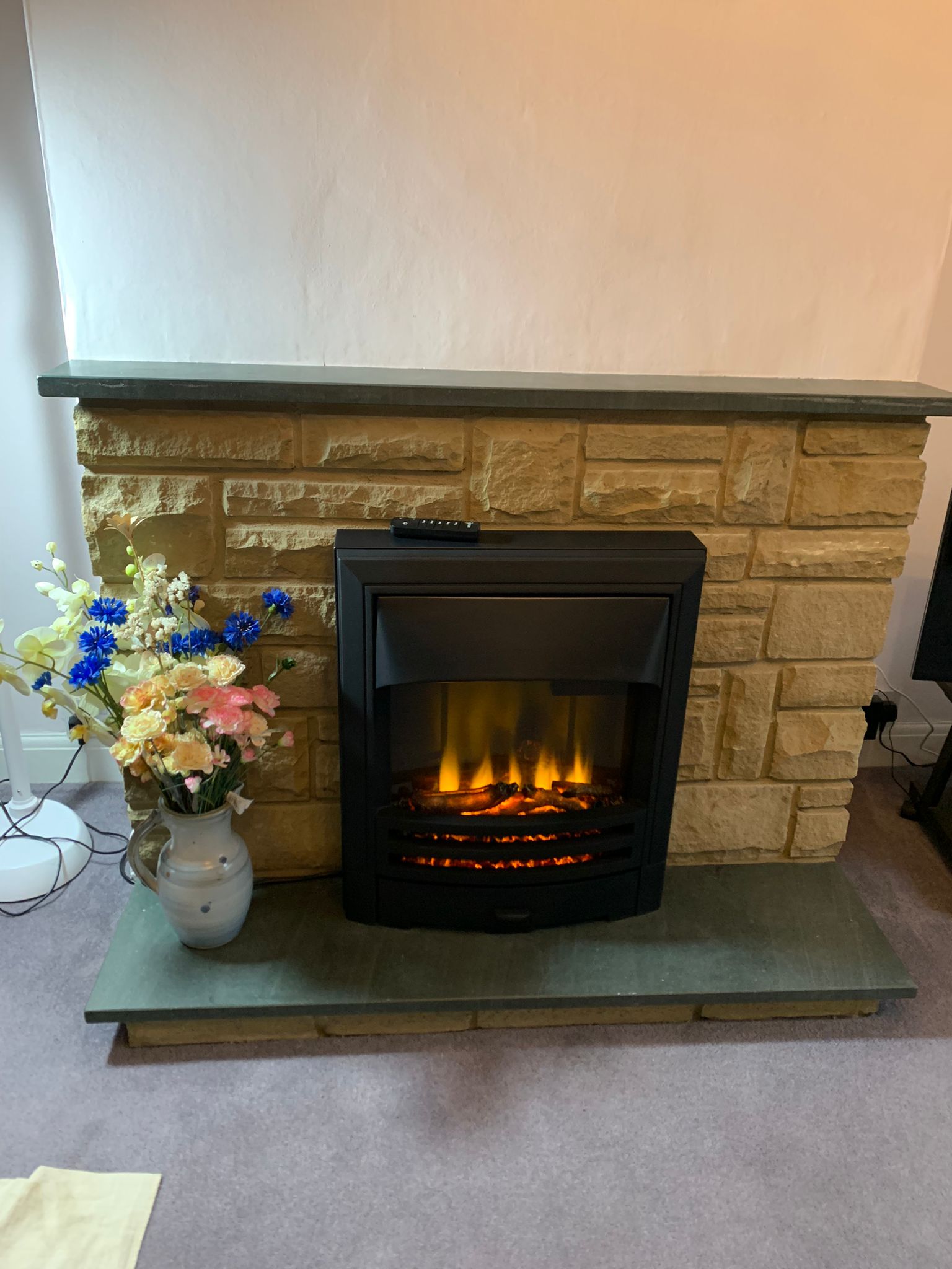 Contemporary Log Effect Electric Fire Installation - Ruislip - Rigbys